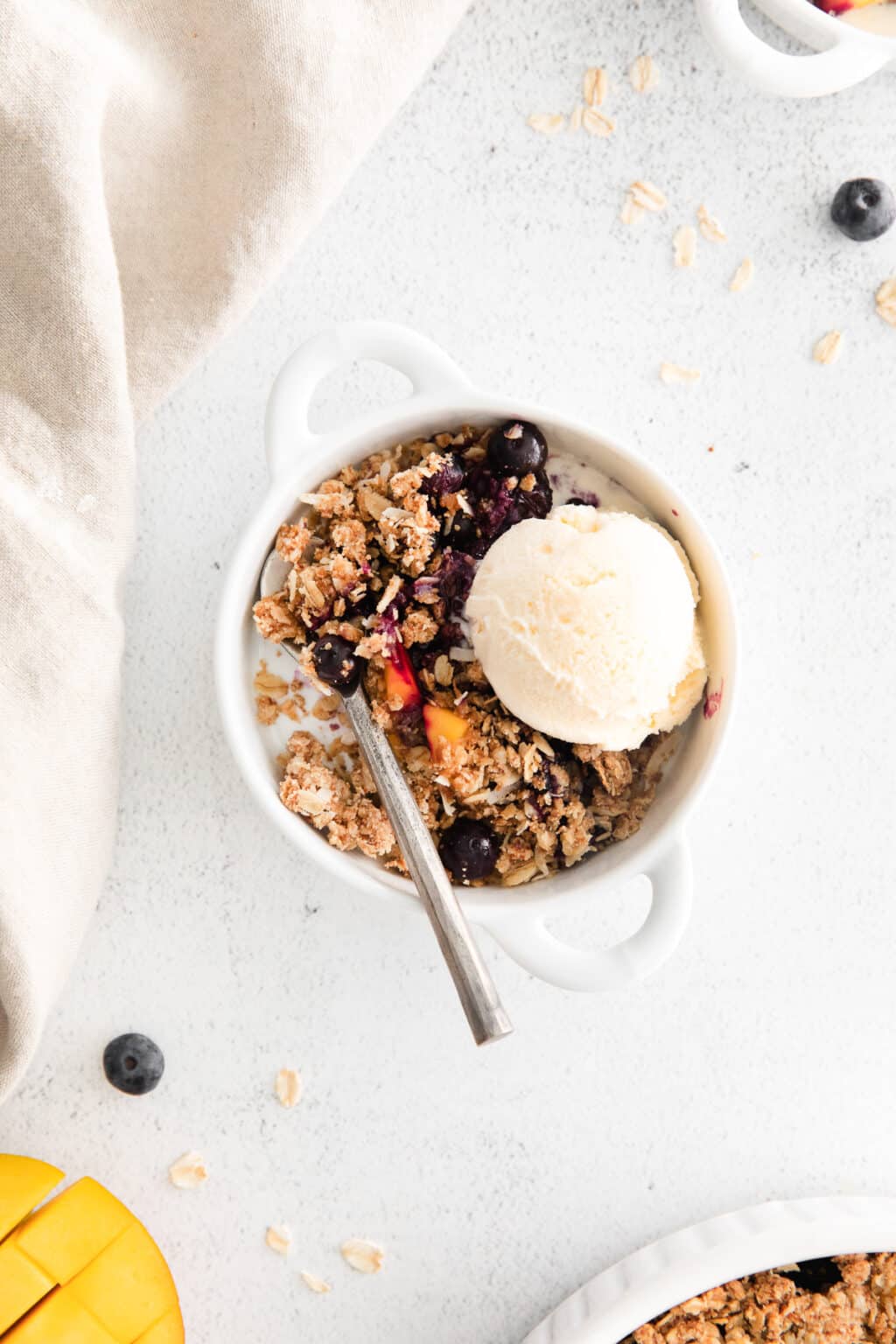 Healthy Blueberry Crisp with Mangos • Fit Mitten Kitchen