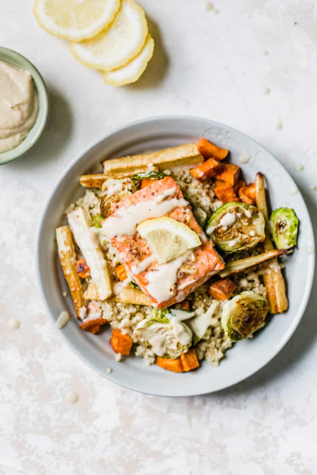 Salmon Power Bowls with lemon tahini dressing • Fit Mitten Kitchen